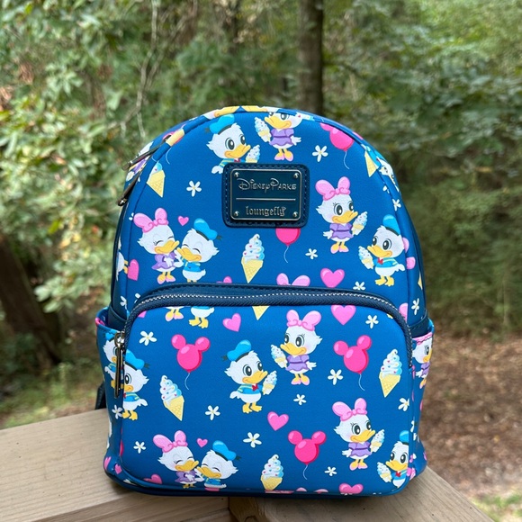 Loungefly | Bags | Loungefly Disney Blue And Pink Backpack | Poshmark